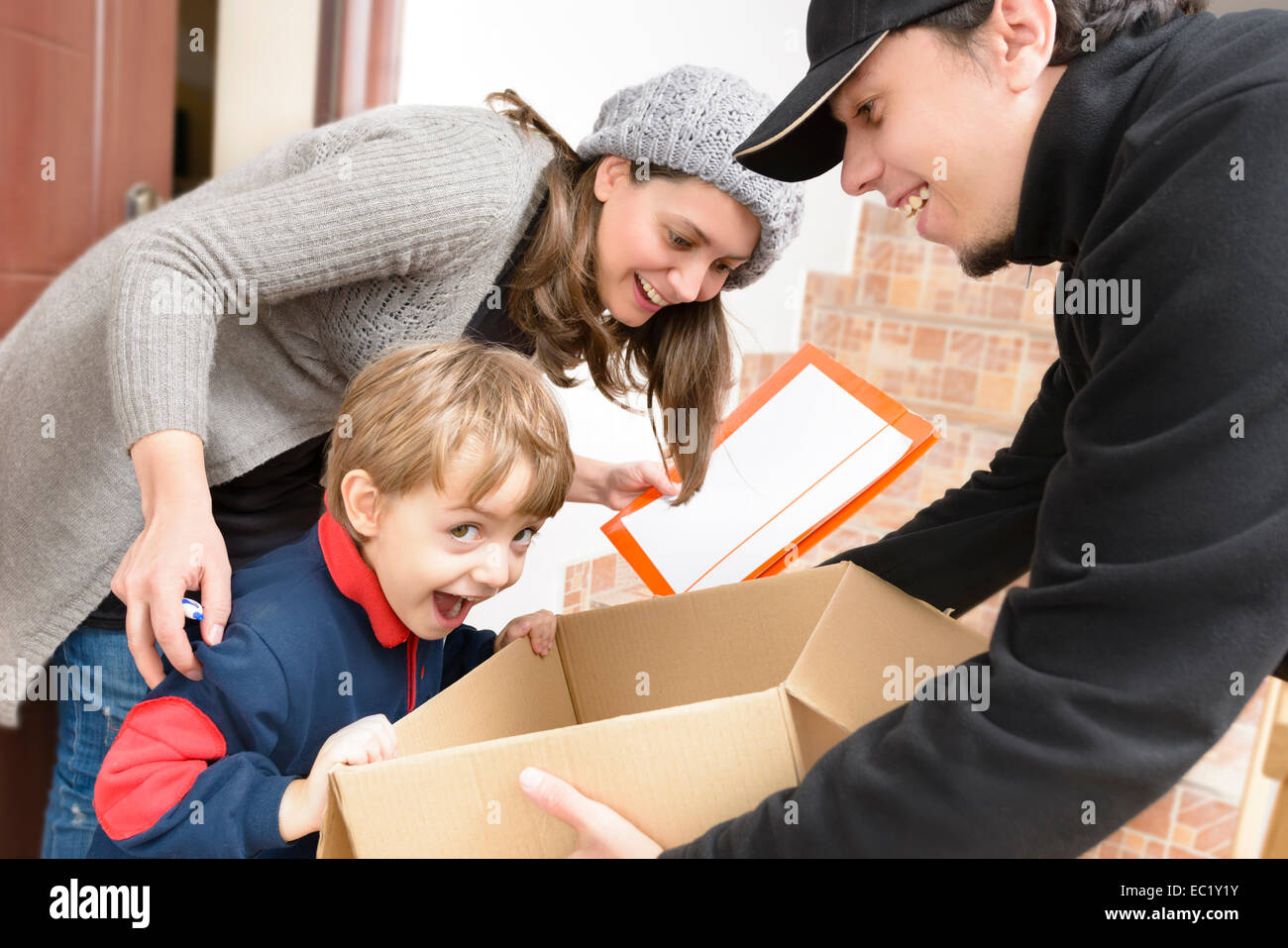 Boy with package hi-res stock photography and images - Alamy