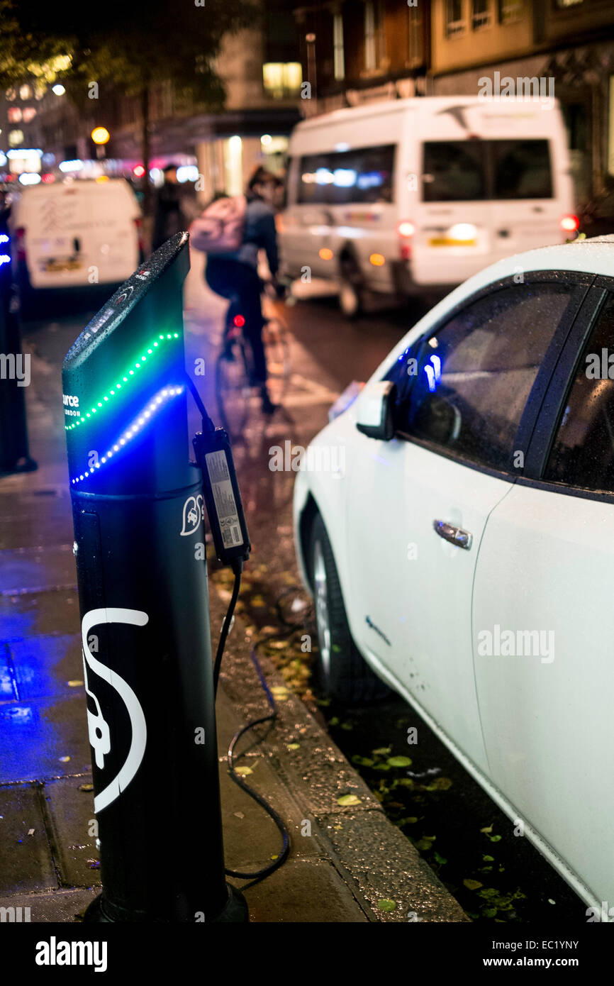 Electric car being charged on the street, London, United Kingdom Stock ...