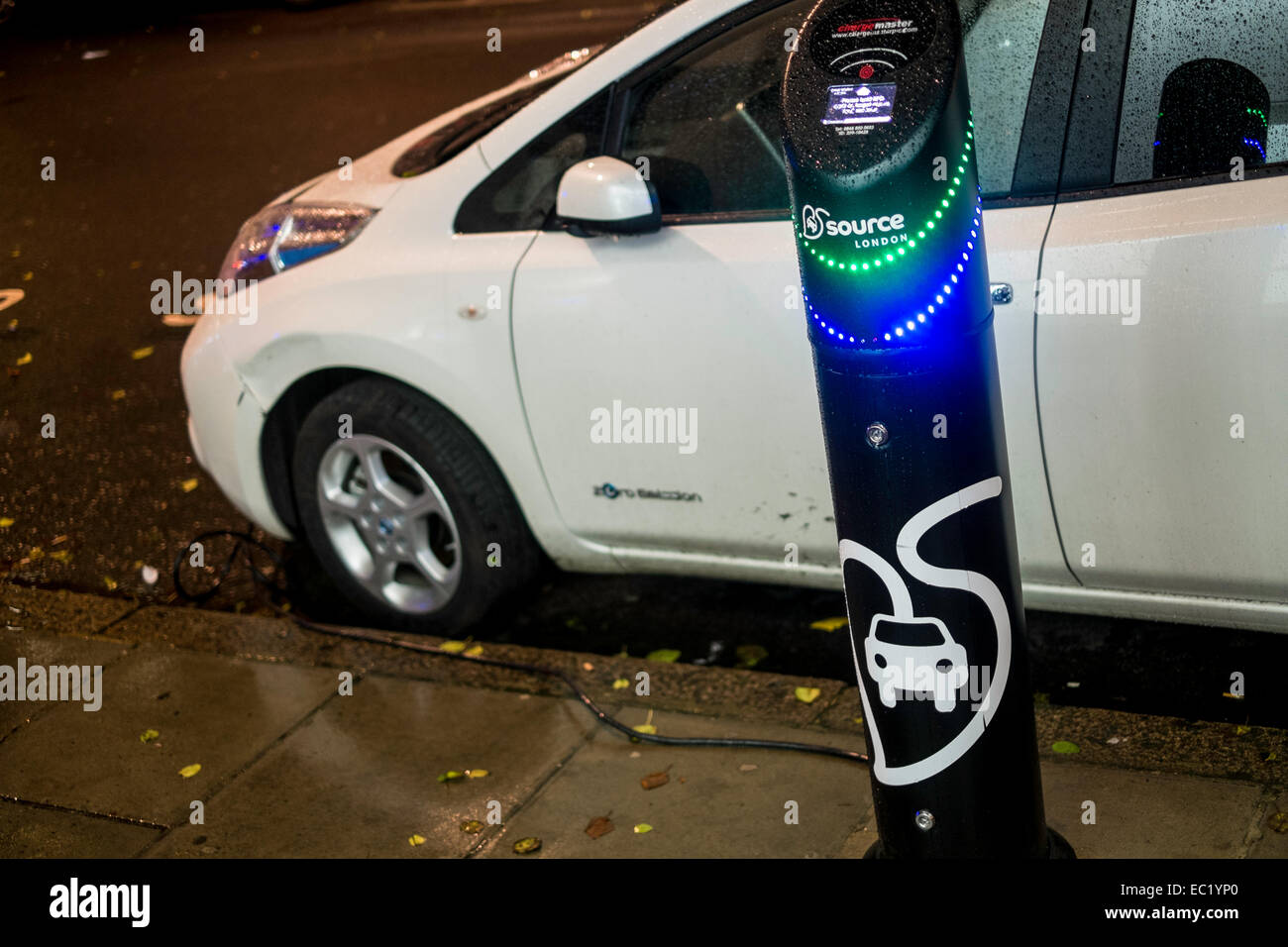 Electric car being charged on the street, London, United Kingdom Stock ...