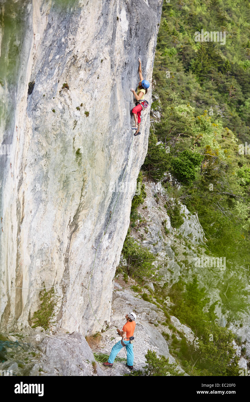 Freeclimber with helmet climbing on a rock face, Martinswand, gallery ...