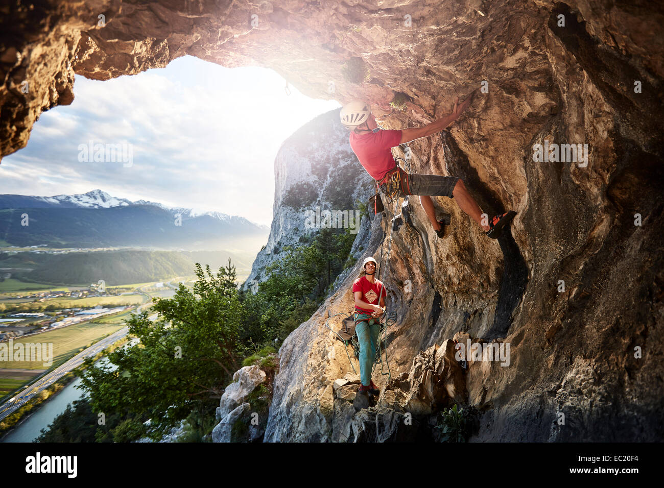 Freeclimber with helmet climbing on a rock face, Martinswand, gallery ...
