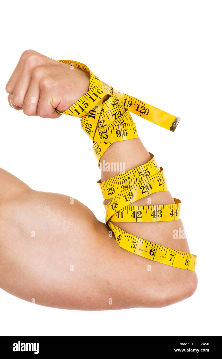 man's arm wrapped in measuring tape showing muscles concept of healthy ...