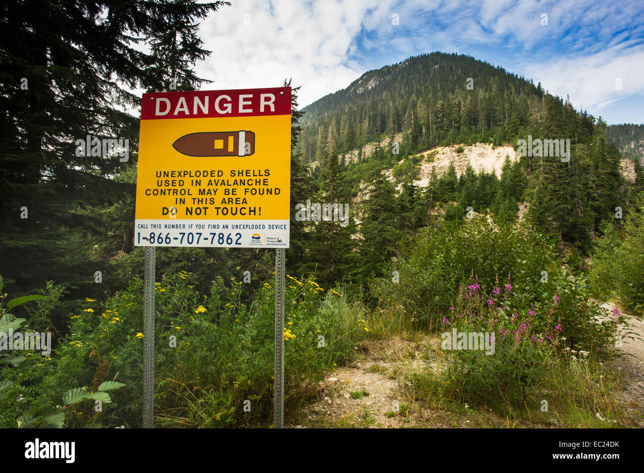 Danger sign warning of unexploded shells used for avalanche maintenance ...
