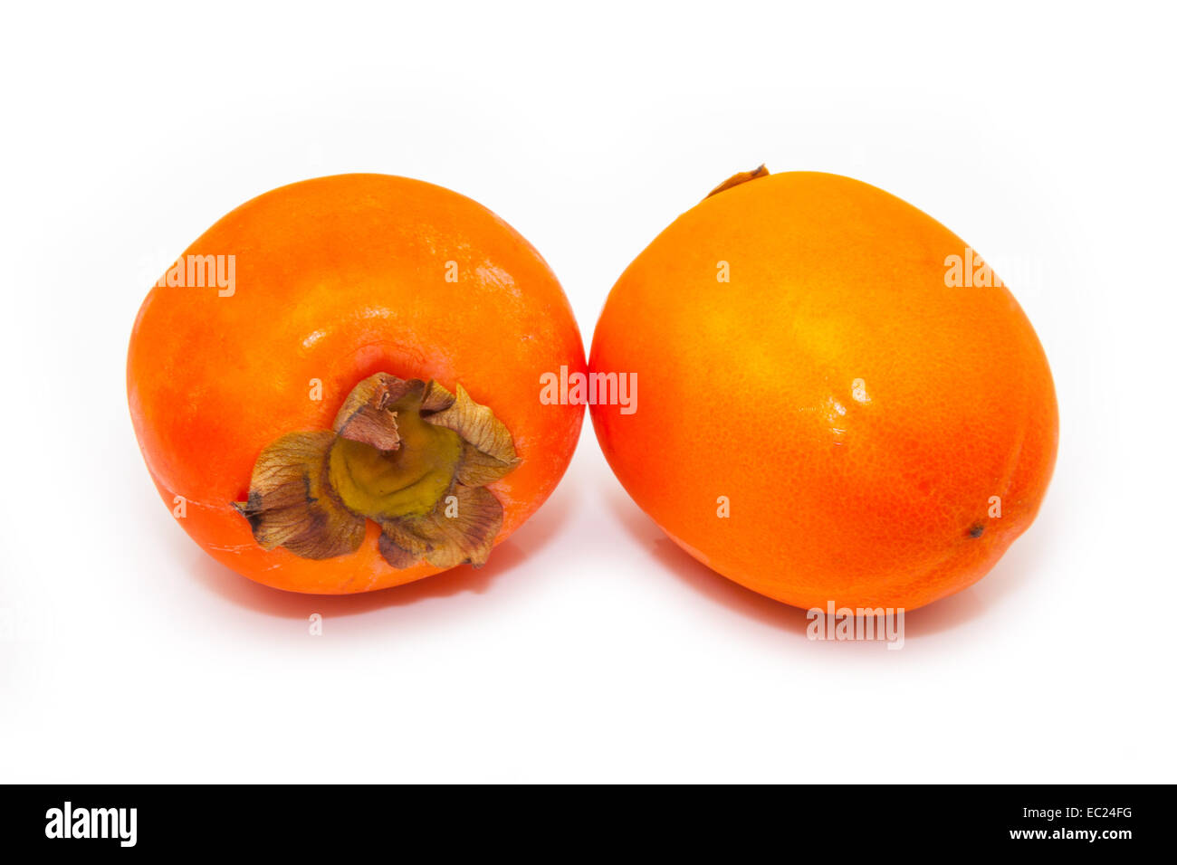 Persimon or sharon fruit isolated on a white studio background Stock ...