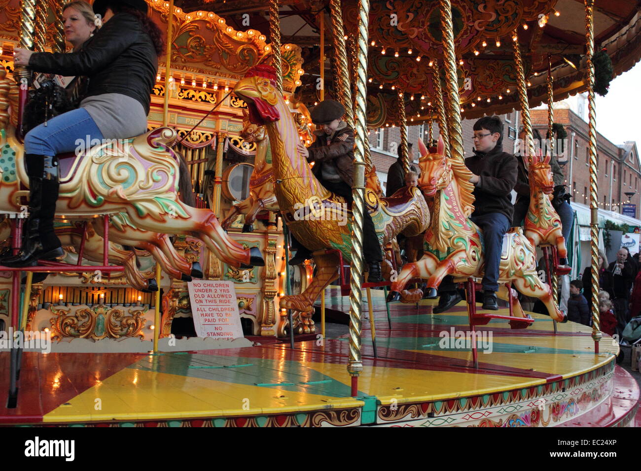 Woman riding carousel horse hi-res stock photography and images - Alamy