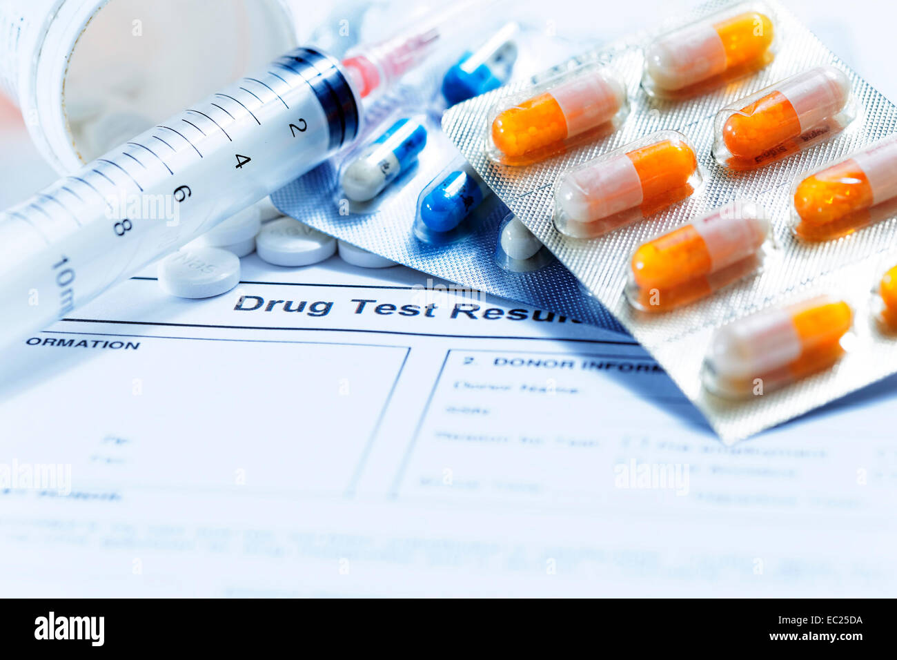 Syringe with glass vials and medications pills drug on white Stock ...
