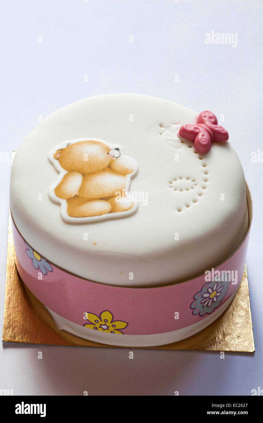Covered with soft icing and edible decorations hi-res stock photography ...