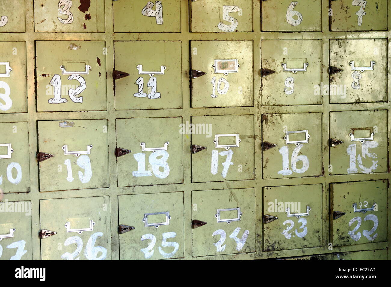 Numbered metallic post office boxes in the hall of a Nepal Post Office ...