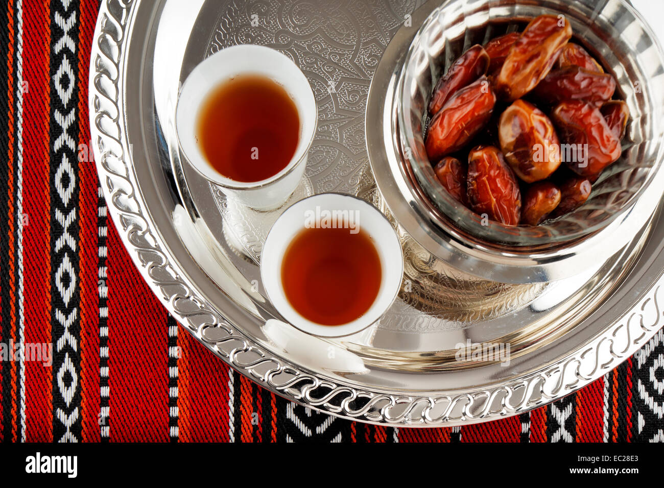 Iconic Abrian fabric with Arabic tea and dates symbolise Arabian ...