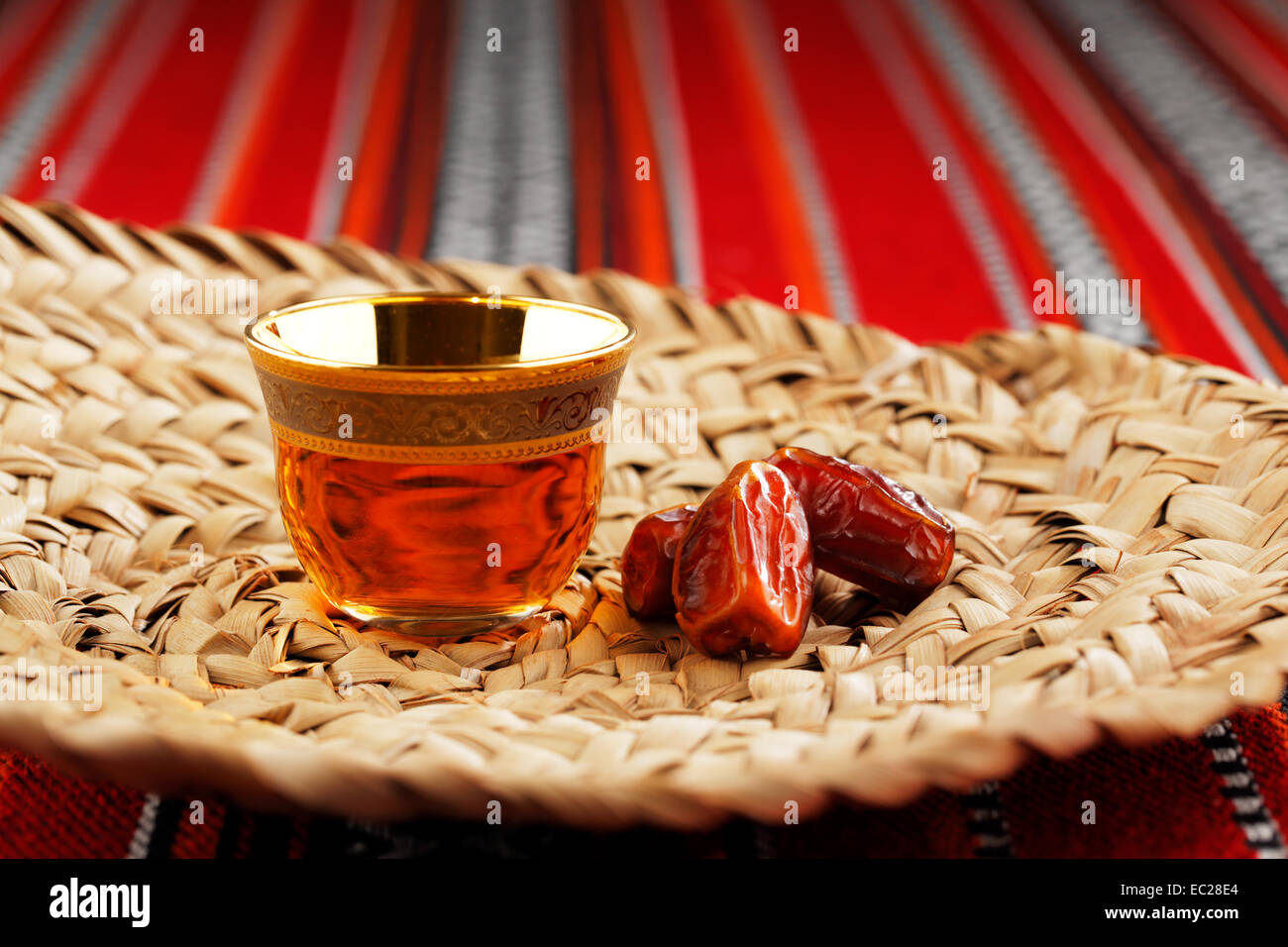 Iconic Abrian fabric with Arabic tea and dates symbolise Arabian ...