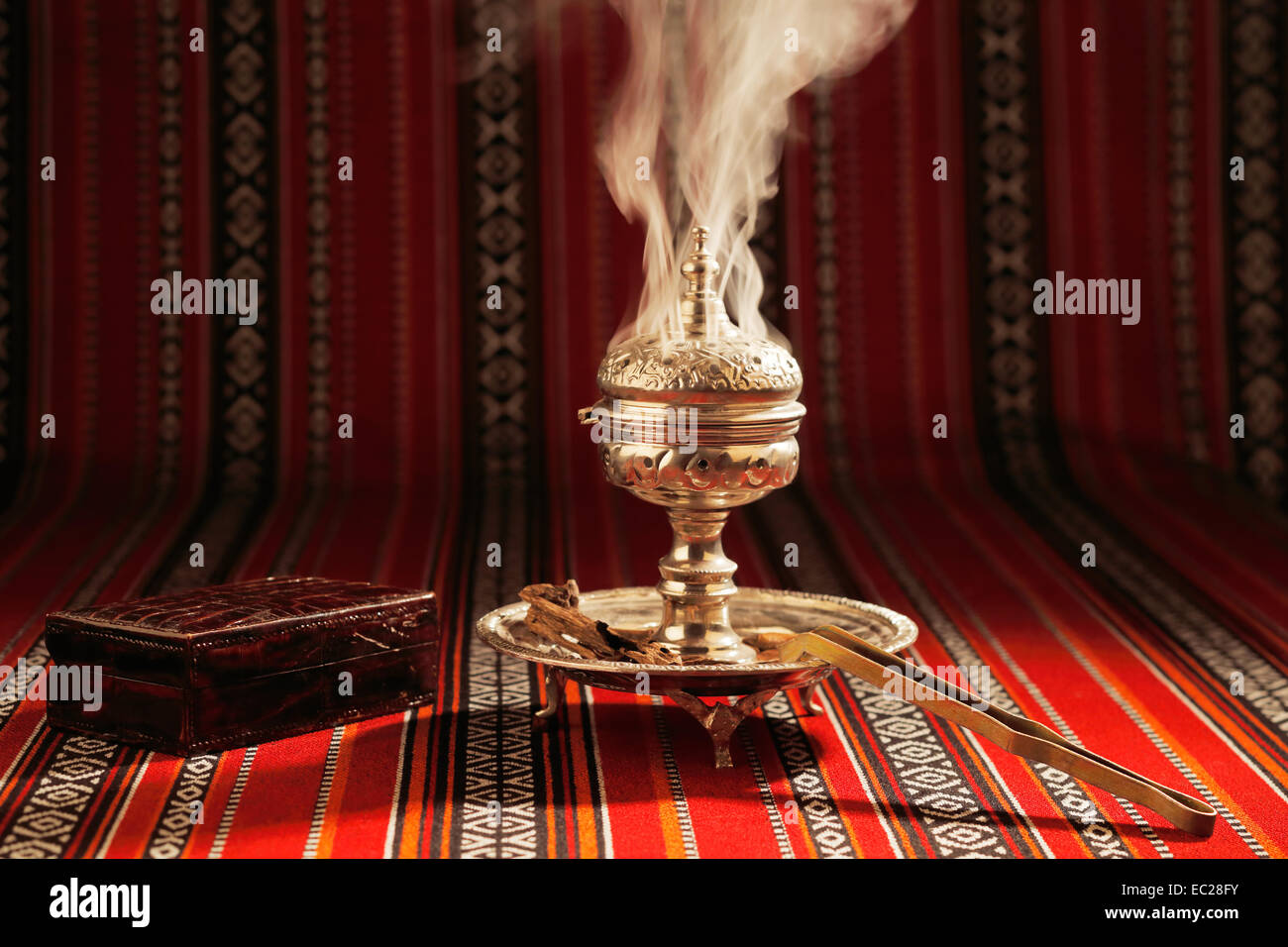 Bukhoor is usually burned in a mabkhara in many Arab countries Stock ...