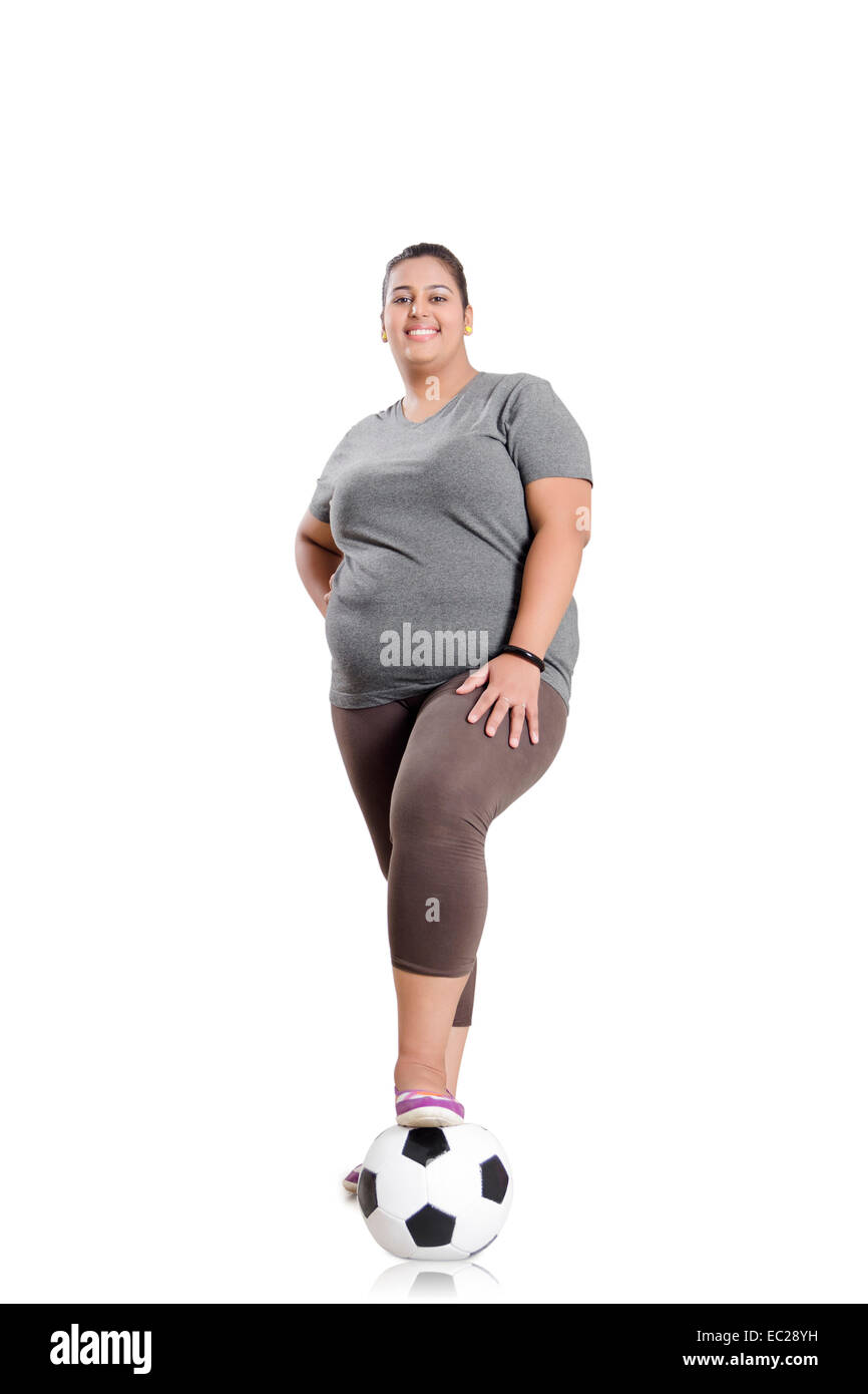 indian Obese Lady playing Football Stock Photo - Alamy