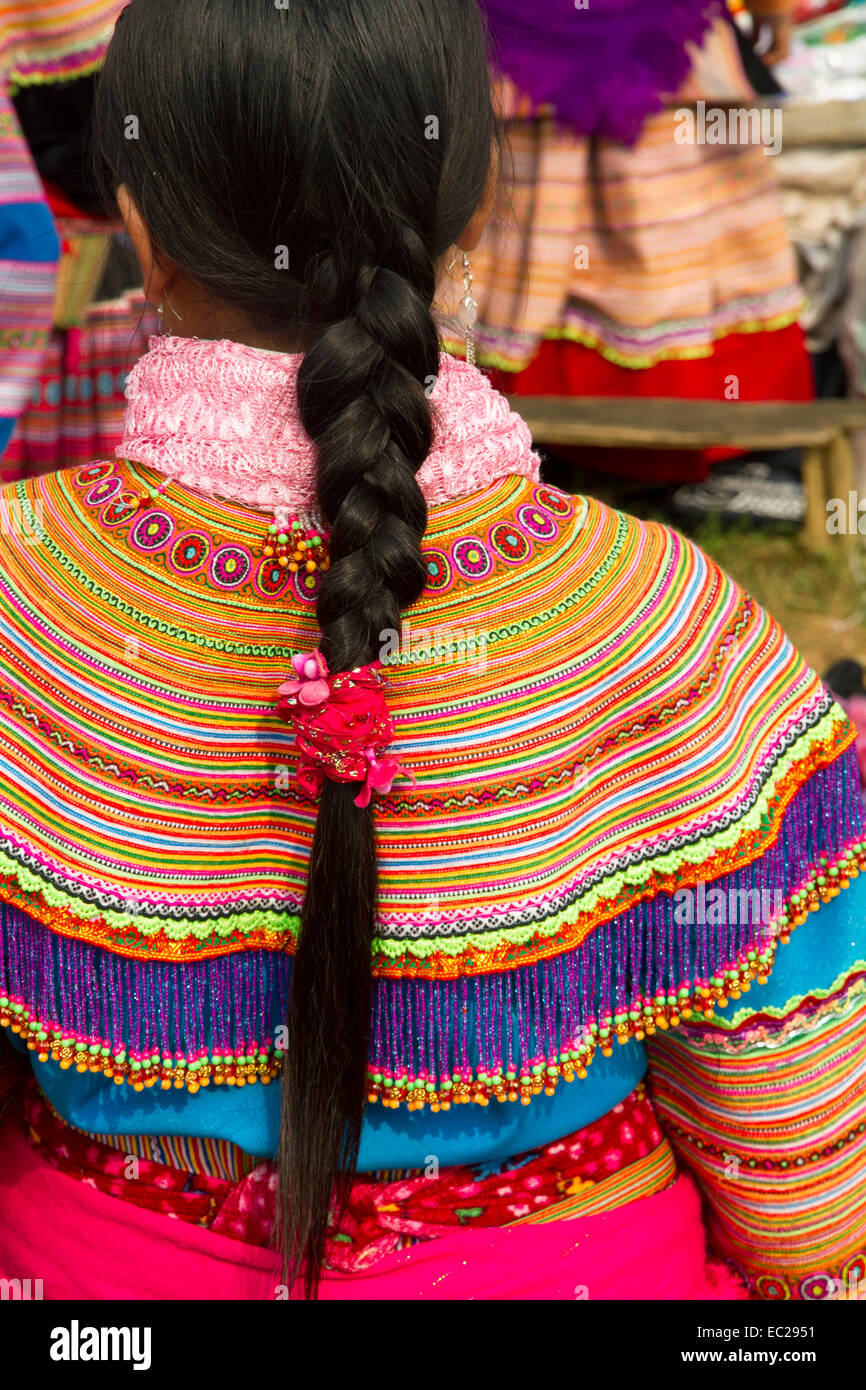 A Flower Hmong dress and hair at Bac Ha morning market Stock Photo - Alamy