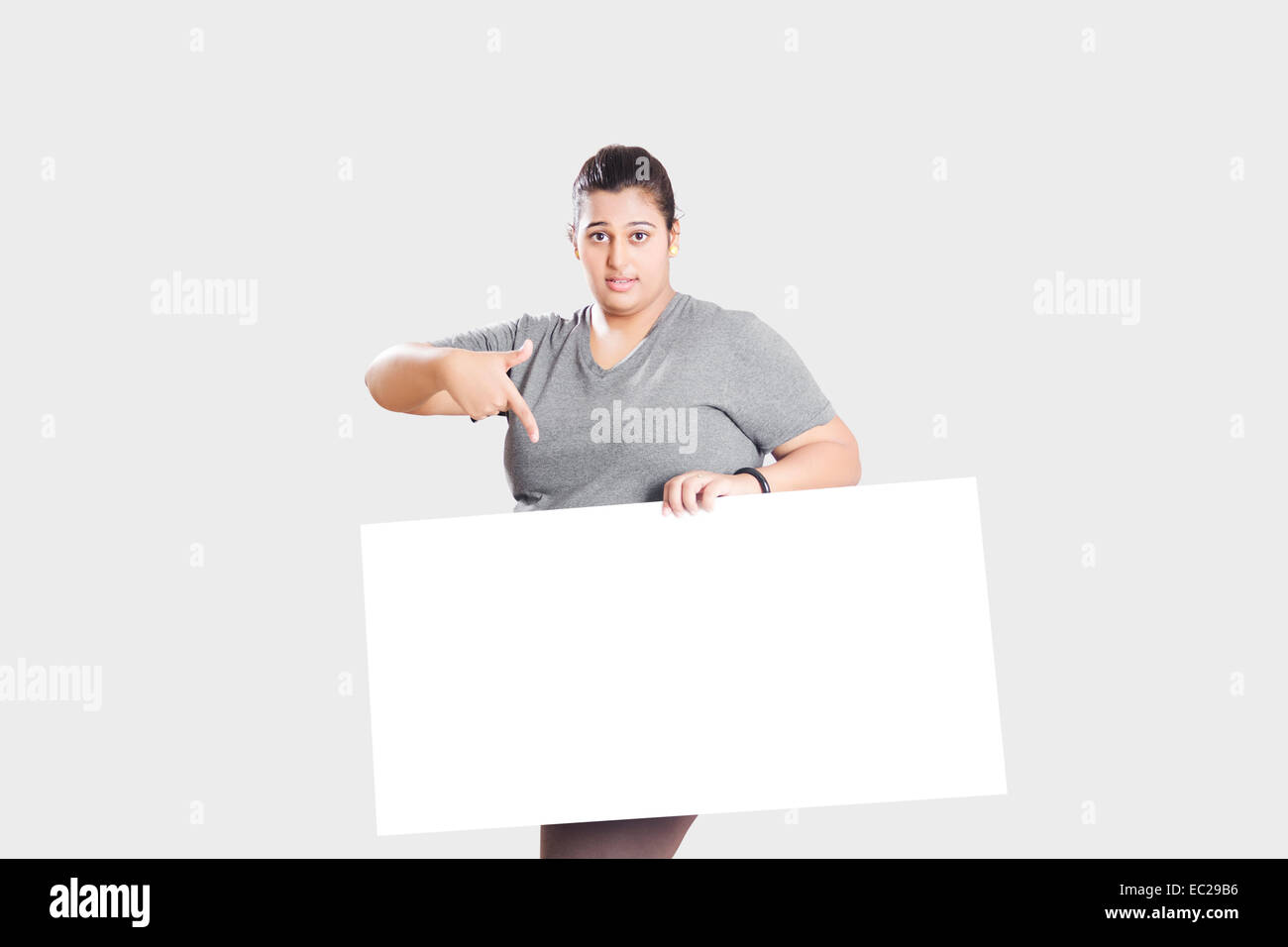 indian Obese Lady Showing Message Board Stock Photo - Alamy