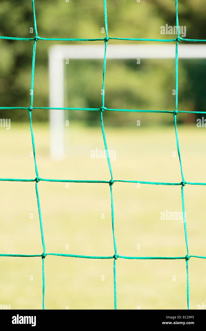 Football field through nets hi-res stock photography and images - Alamy