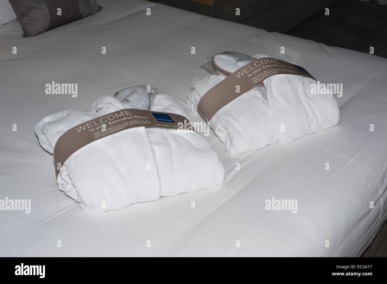 Welcome pack of bathrobe & slippers in Executive Room at Novotel hotel ...