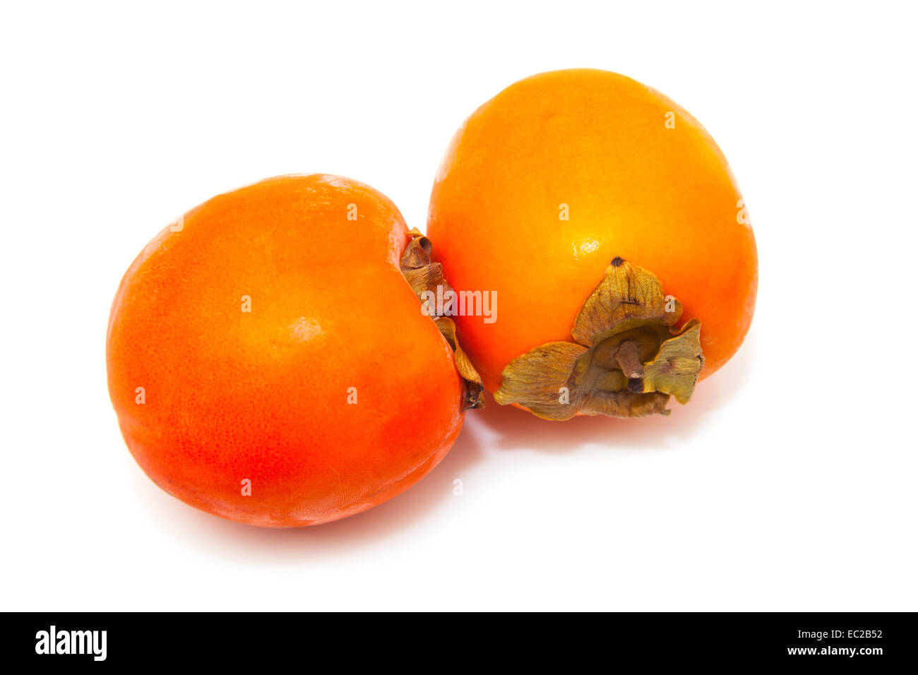 Persimon or Sharon fruit isolated on a white studio background Stock ...