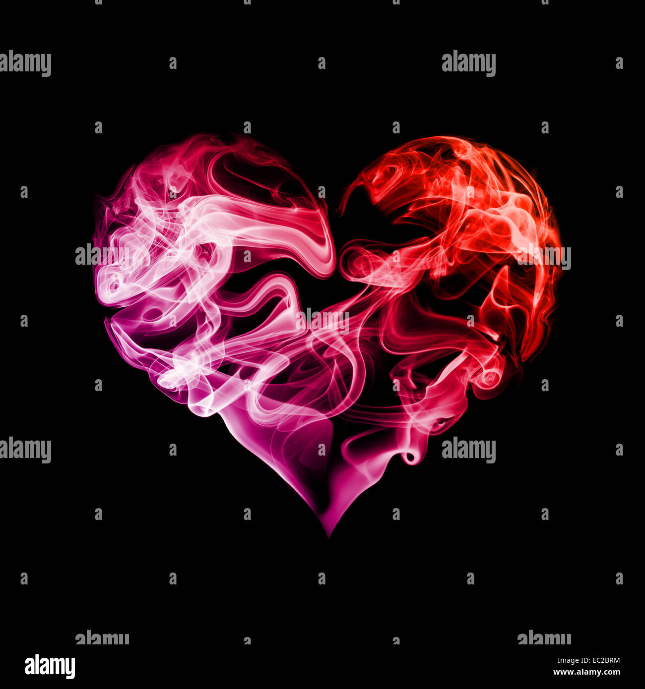 Abstract red heart from smoke on dark background Stock Photo - Alamy