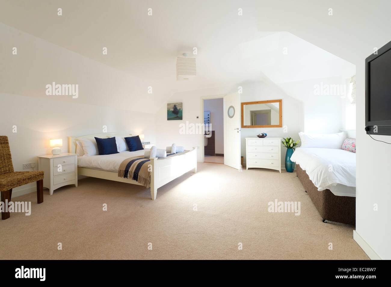 A holiday home bedroom Stock Photo - Alamy