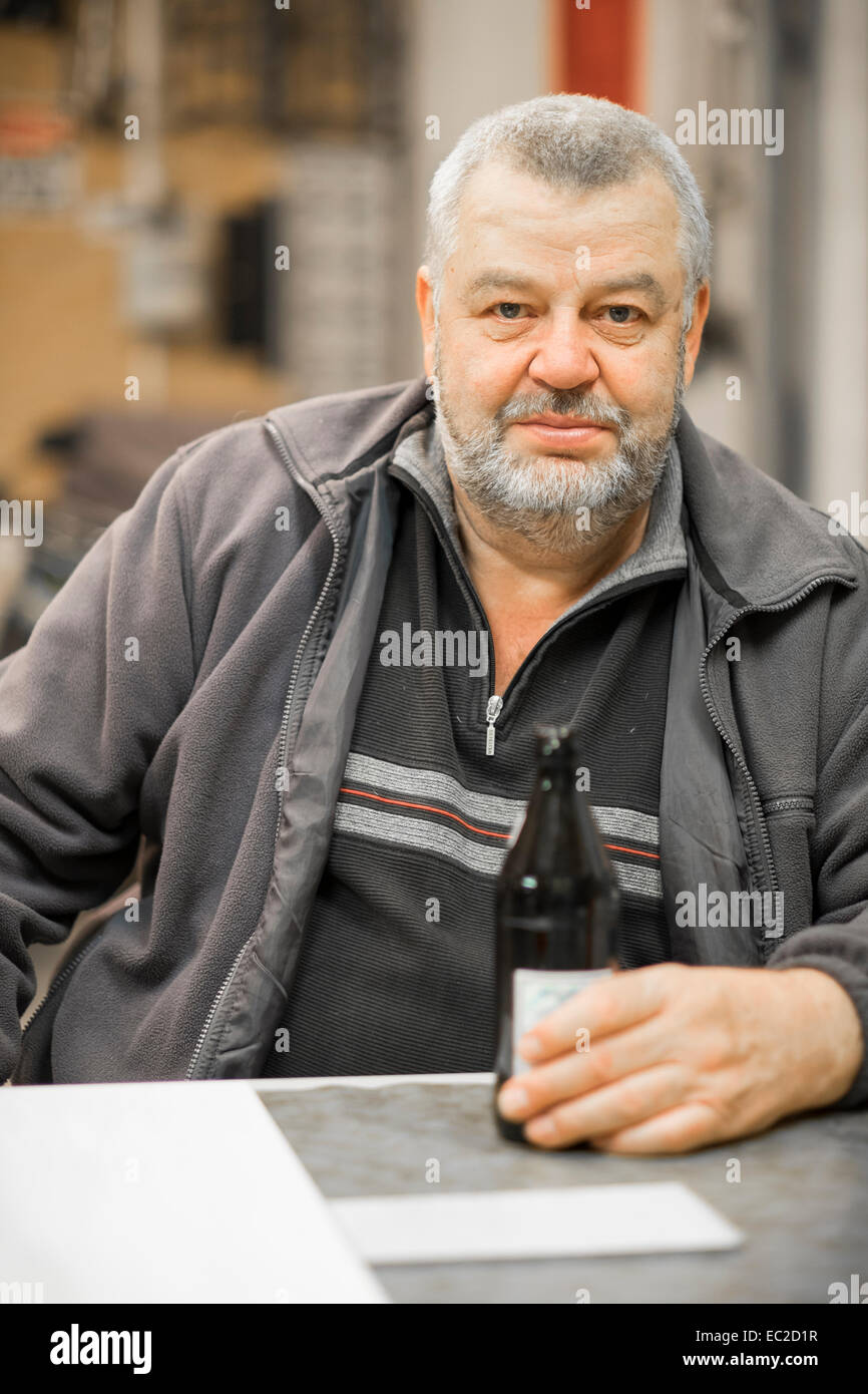 Old man beer table hi-res stock photography and images - Alamy