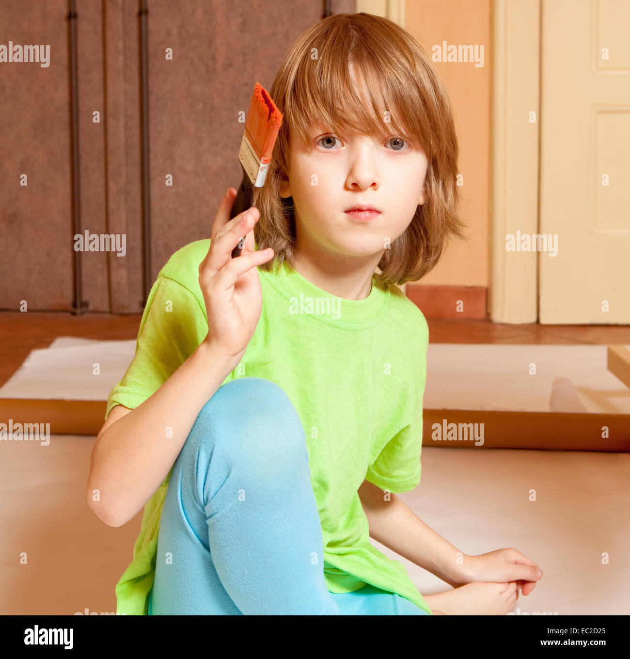 Portrait of a Boy Painting with Red Color Stock Photo - Alamy