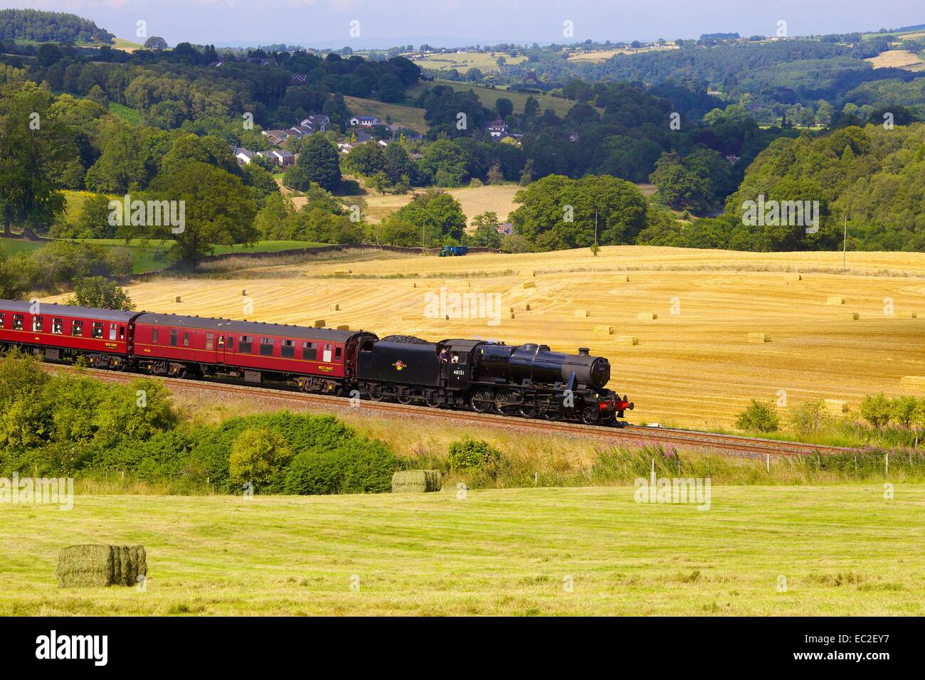LMS Stanier Class 8F 48151, steam train passing hay field, Eden Valley ...