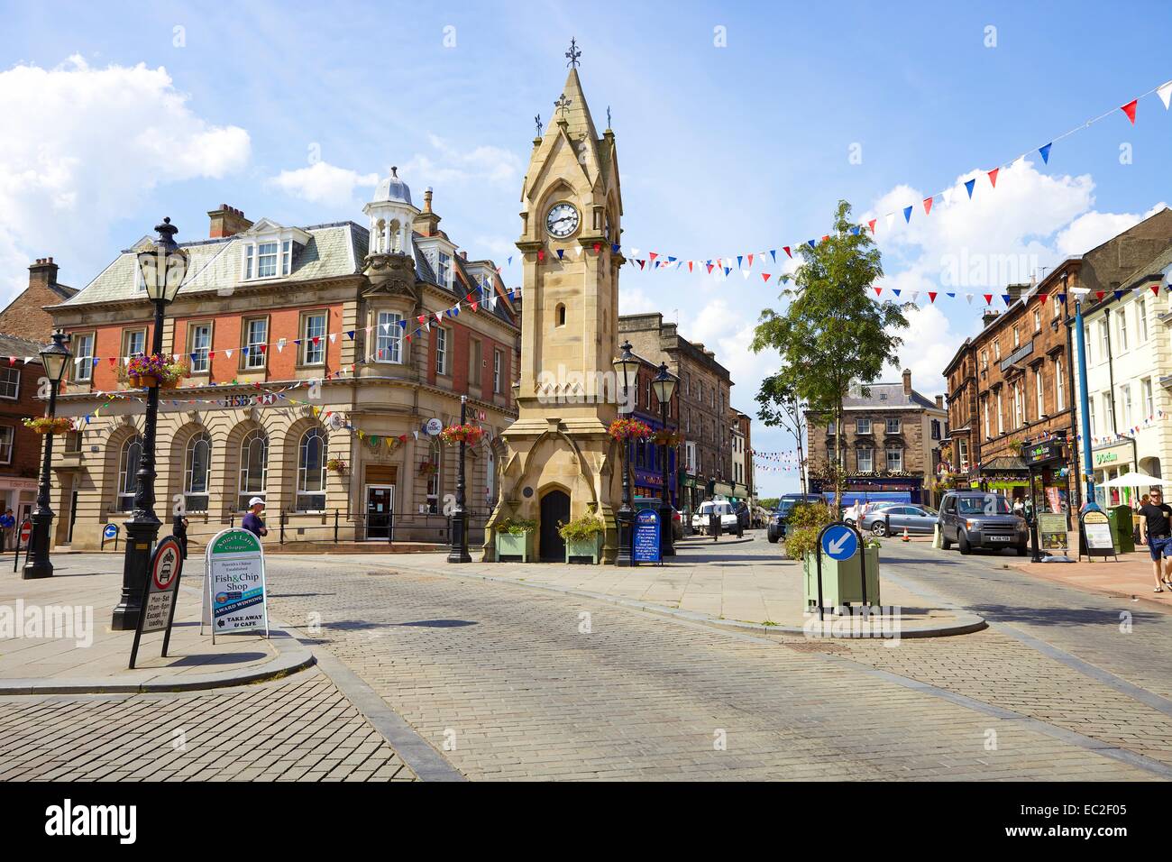 Town clock in the paved Market Square, King Street in Penrith town ...