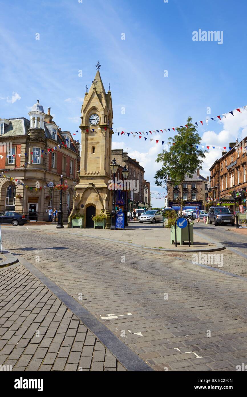 Town clock in the paved Market Square, King Street in Penrith town ...