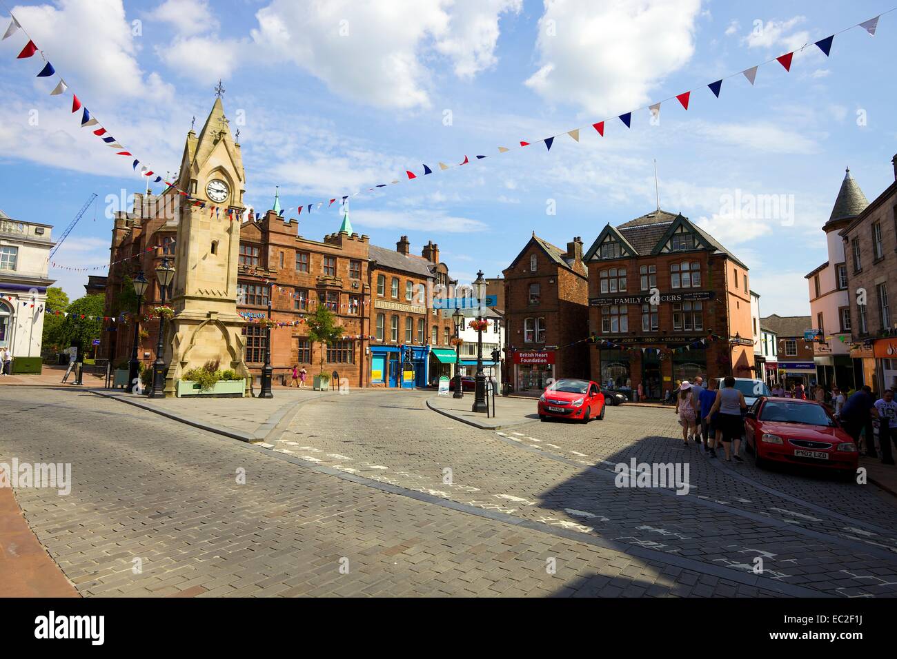 Town clock in the paved Market Square, King Street in Penrith town ...