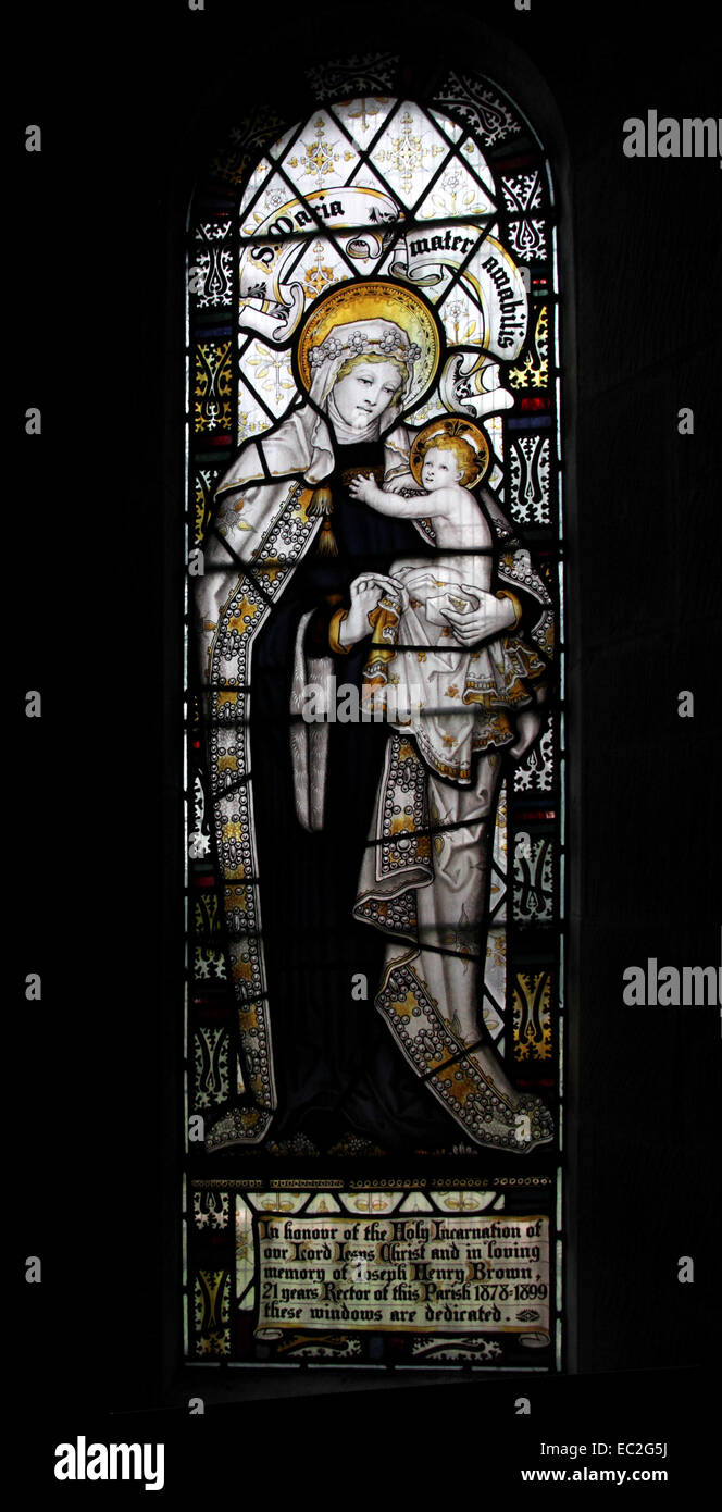 A stained glass window by the Kempe Studios depicting Madonna & child ...