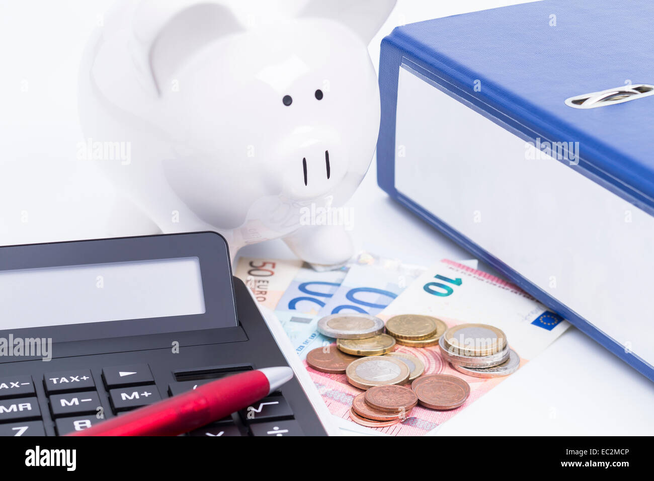 Money and calculator hi-res stock photography and images - Alamy