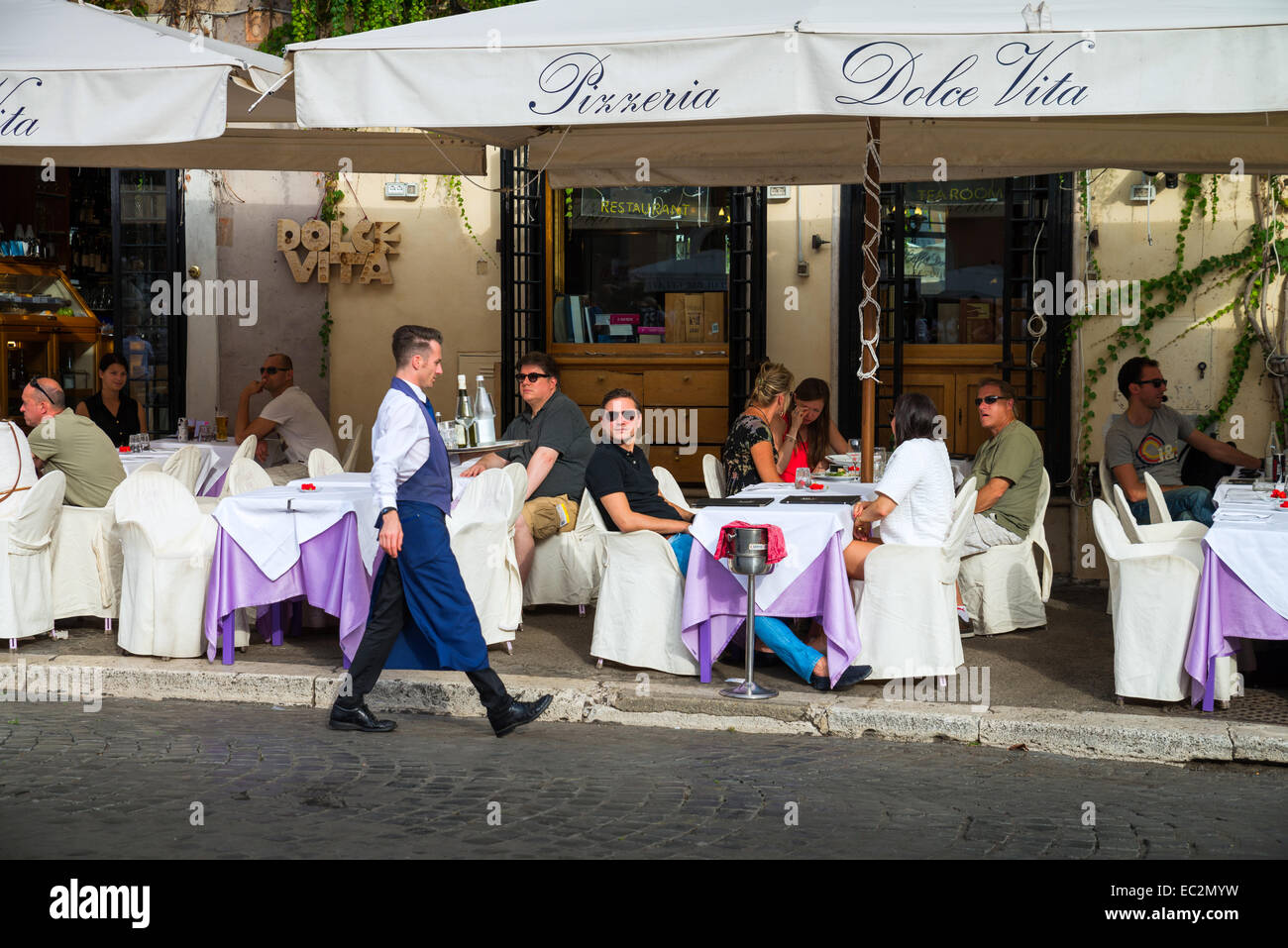 People sitting at outdoor restaurant cafe Rome, Italy Stock Photo - Alamy