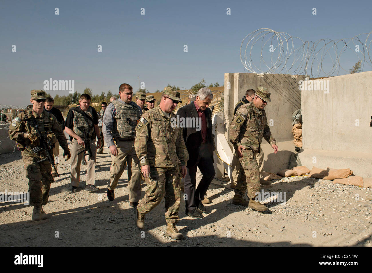 US Secretary of Defense Chuck Hagel walks with Brig Gen. Christopher ...
