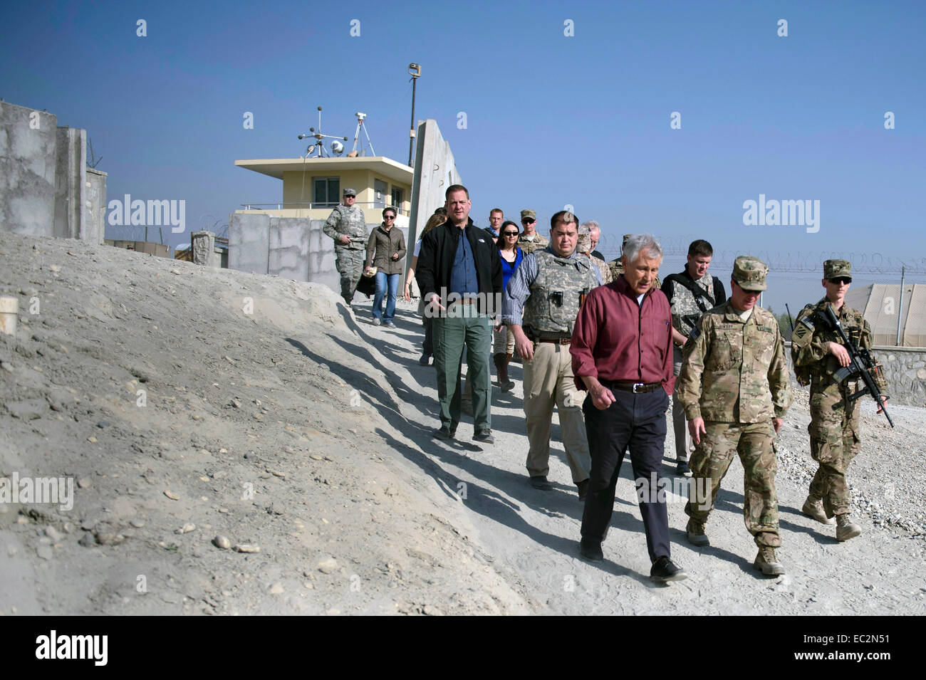 US Secretary of Defense Chuck Hagel walks with Brig Gen. Christopher ...