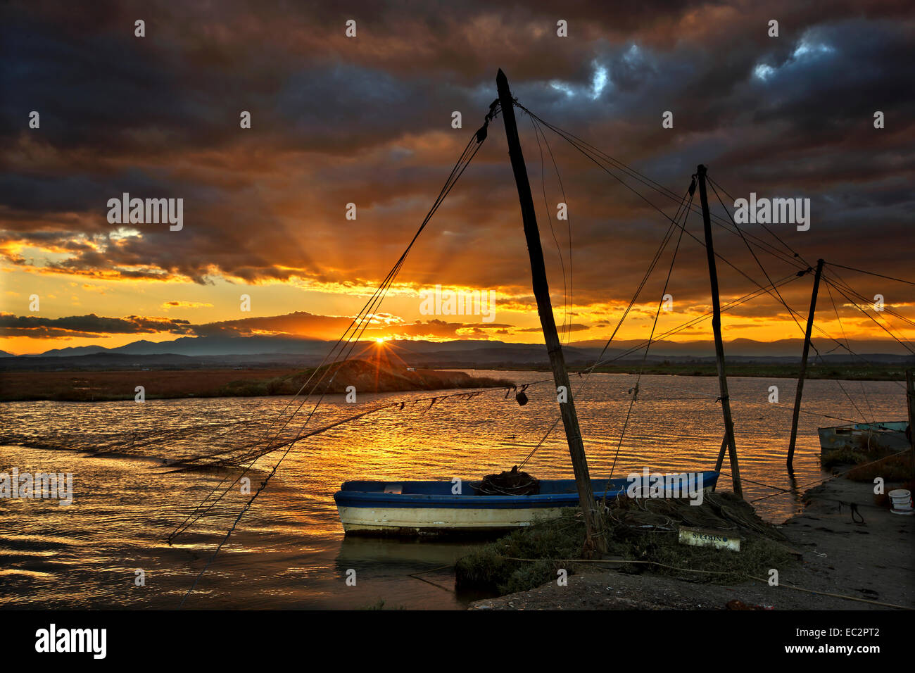 Sunset at a "Daliani" (traditional way of fishing) at the Delta of ...