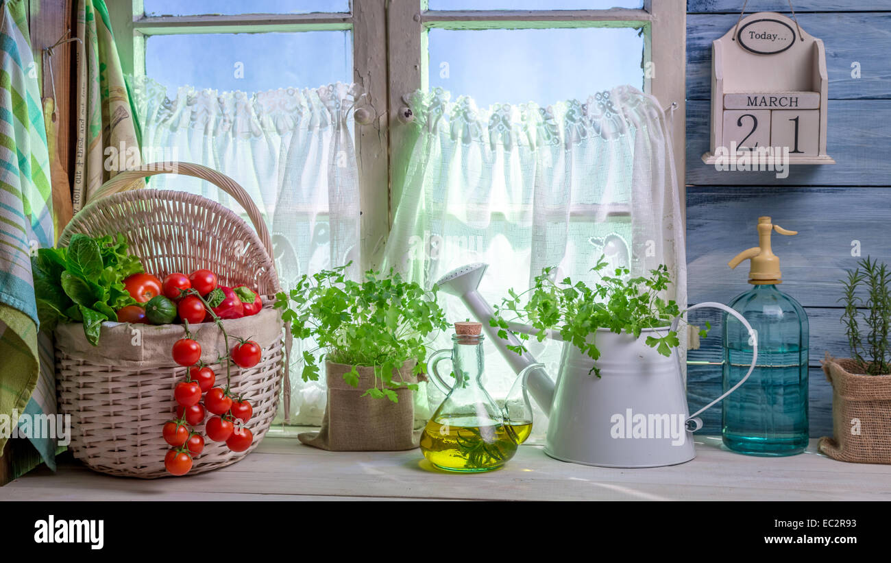 Full kitchen with fresh spring vegetables Stock Photo - Alamy