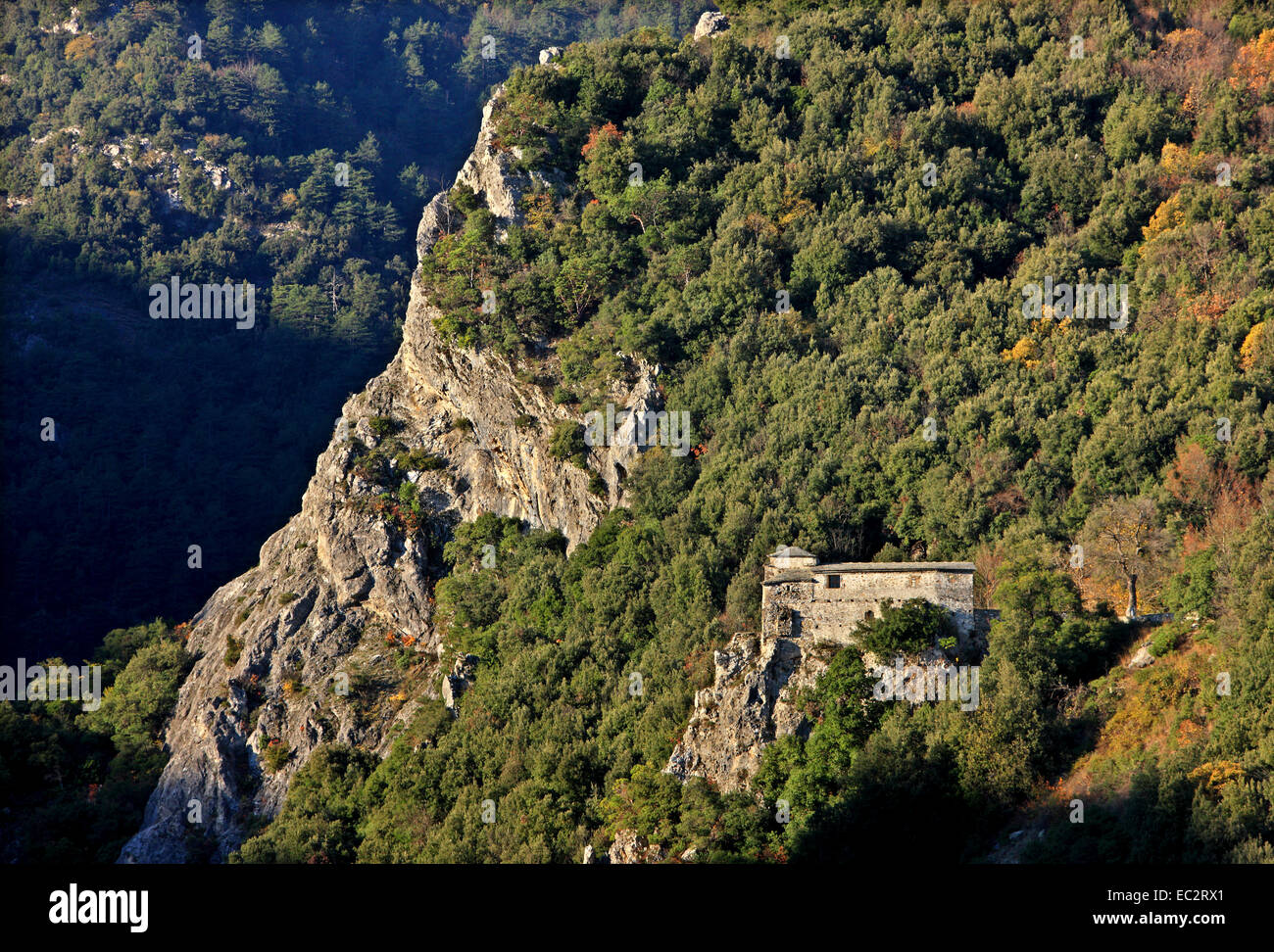 The church of the abandoned monastery of Agia Triada, hanging over a ...