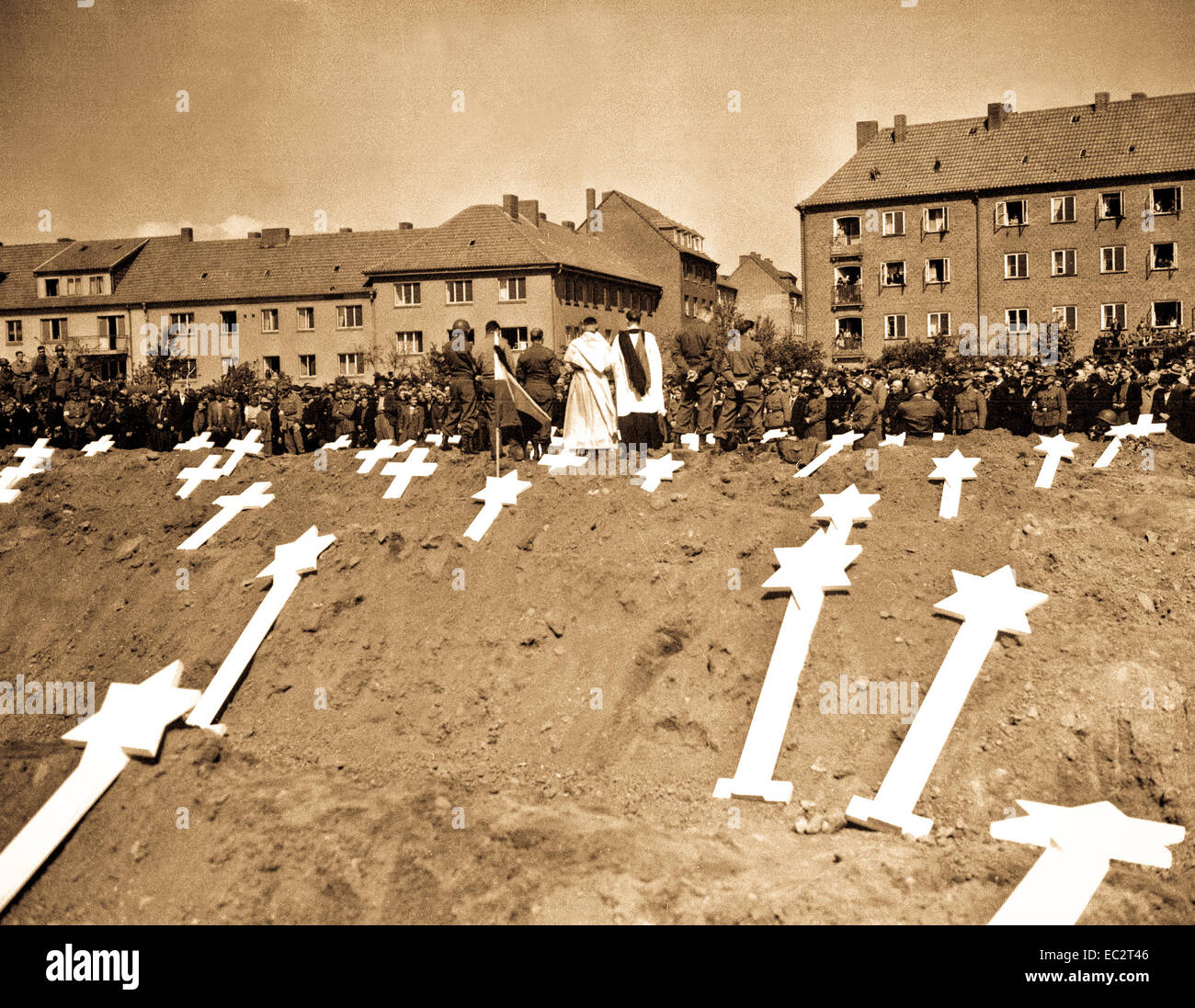 These markers are for the graves of 80 victims of the Nazis found in ...