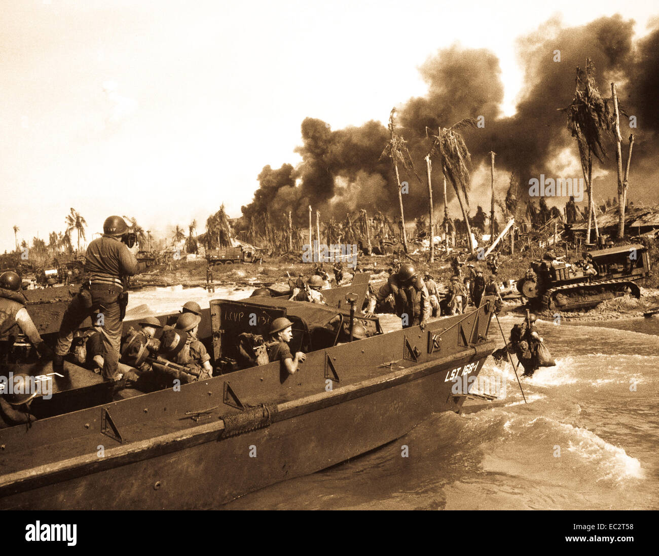 Australian troops storm ashore in the first assault wave to hit ...