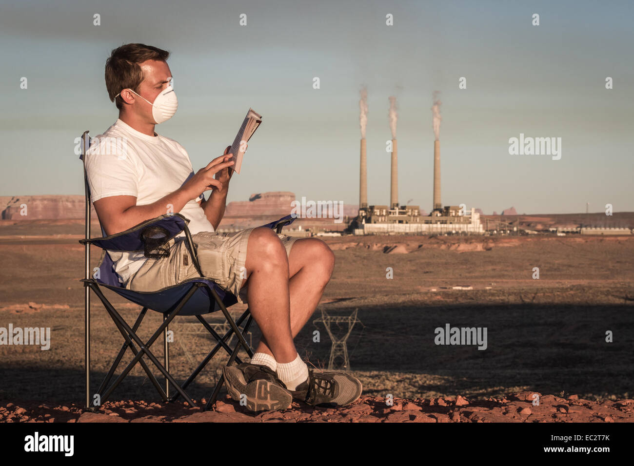 concept image of a man sitting reading a book wearing a mask with a ...