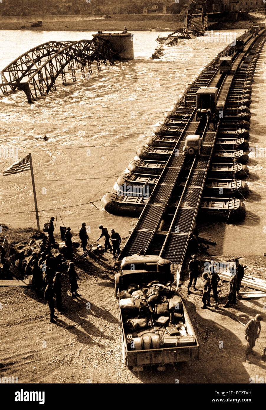 The war over, German soldiers here are crossing a pontoon bridge from ...