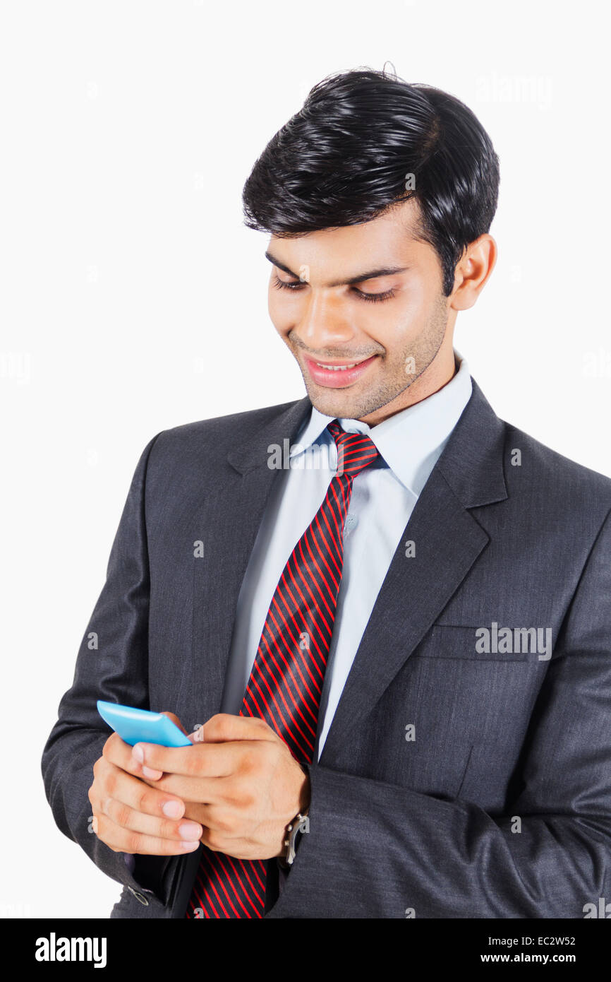 indian Business man Dialing phone Stock Photo - Alamy
