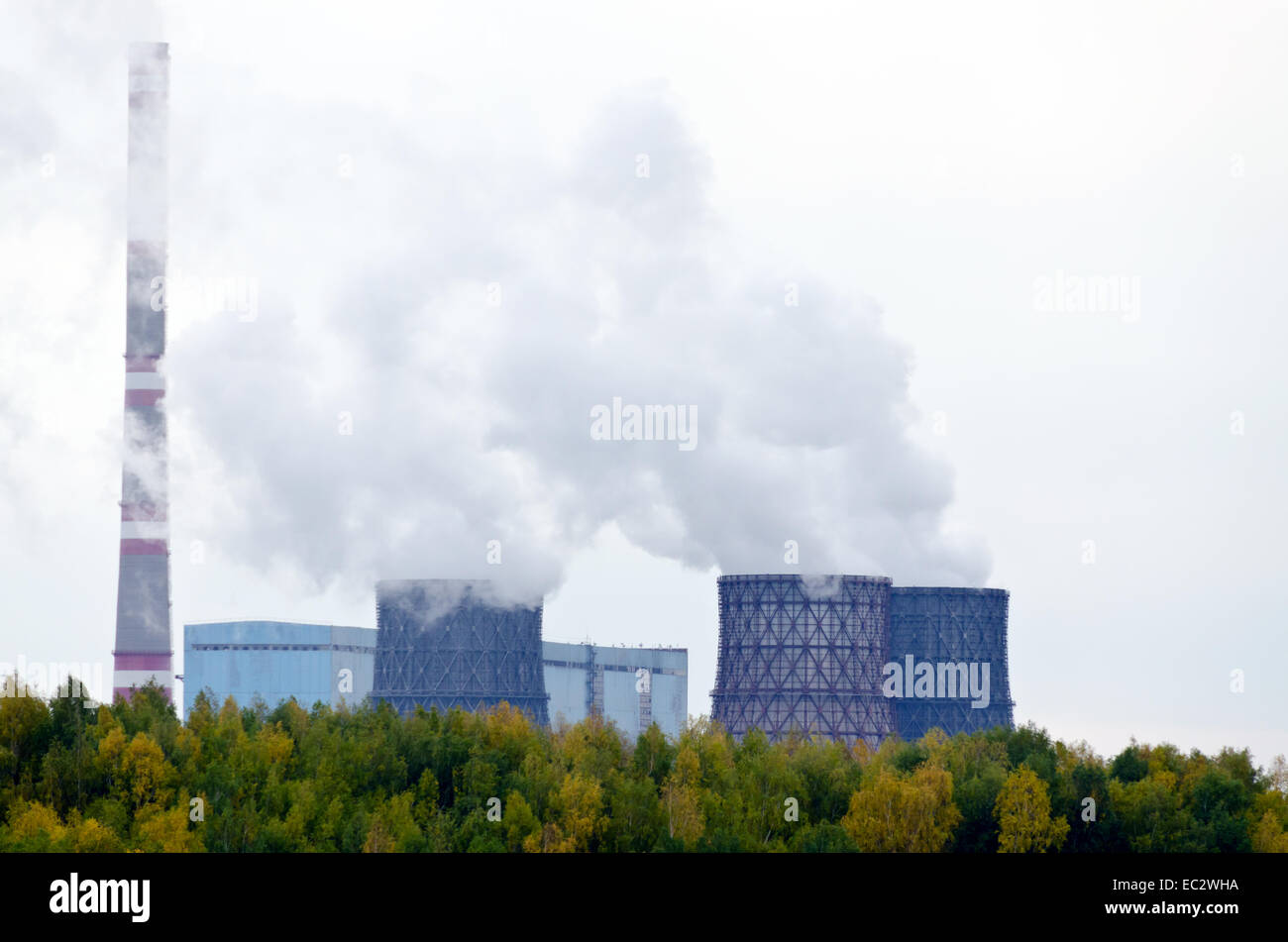 Coal power station behind fall forest Stock Photo - Alamy