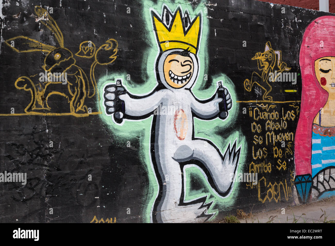 Urban art depicting a happy boy wearing a crown in the Spanish colonial ...