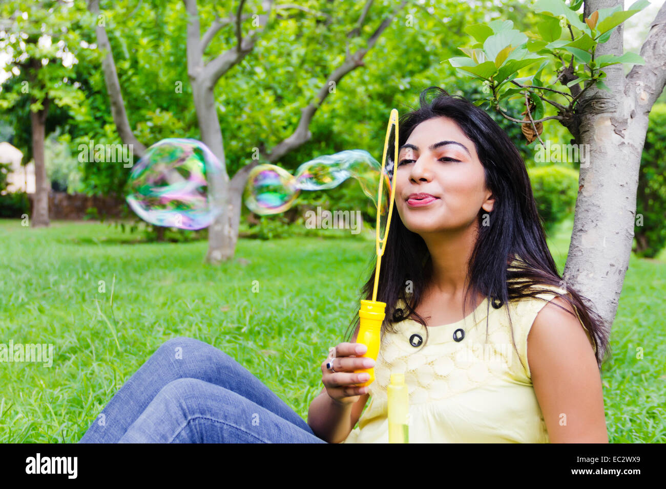 indian Beautiful lady park playing Bubble Wand Stock Photo - Alamy