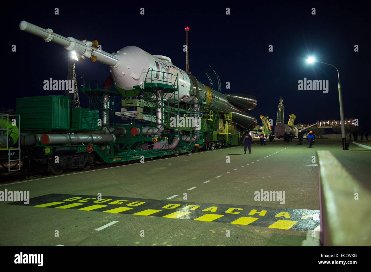 The Soyuz TMA-15M spacecraft is rolled out to the launch pad by train ...