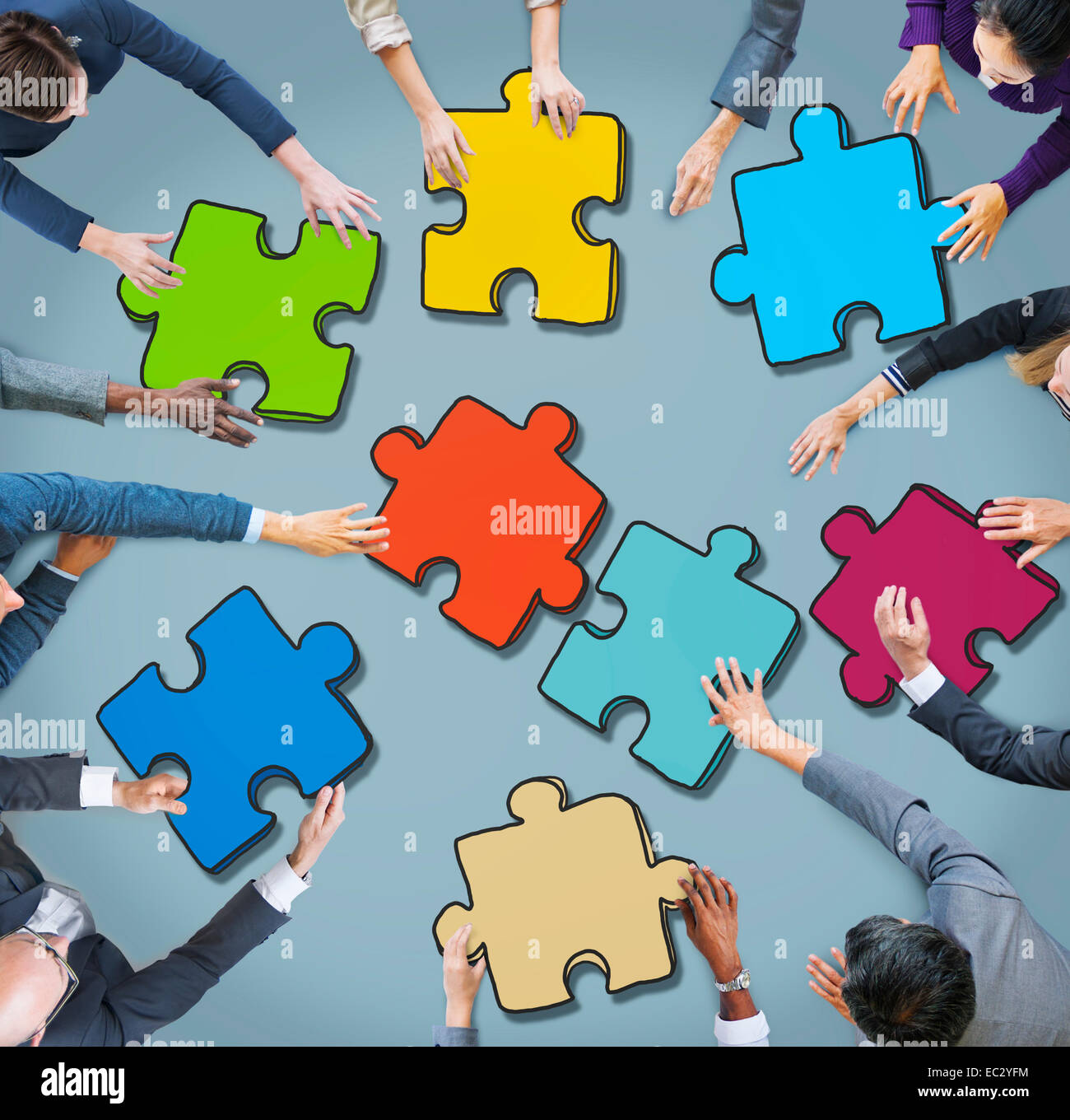 Group of Business People Forming Jigsaw Puzzle Stock Photo - Alamy