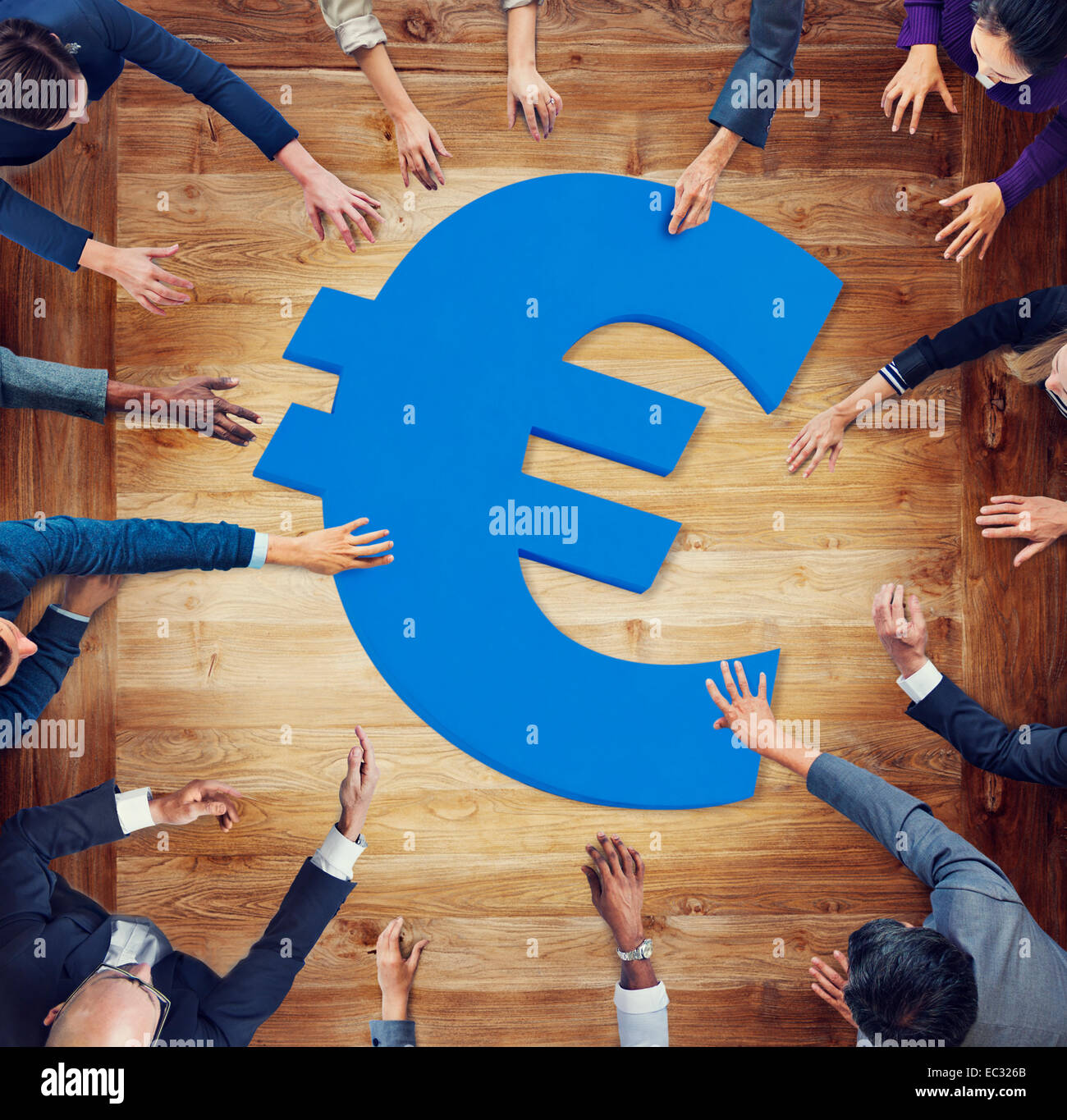 Diverse Business People Around Currency Symbol Stock Photo - Alamy