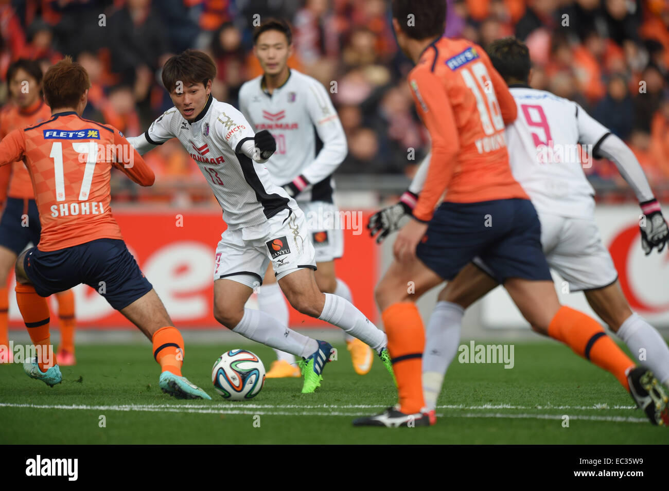 Saitama, Japan. 6th Dec, 2014. Shohei Takahashi (Ardija), Takumi Minamino (Cerezo) Football ...