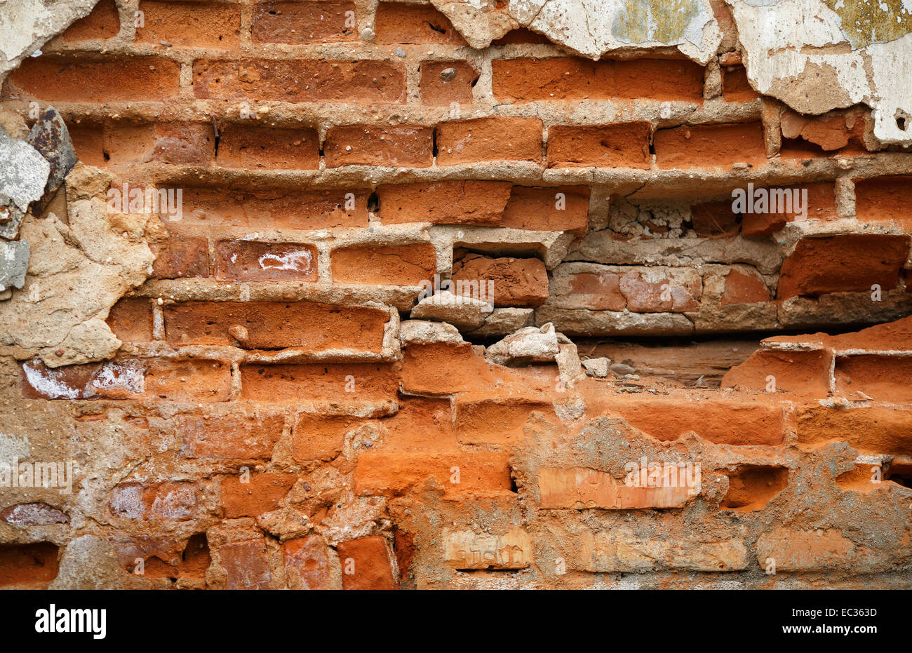 Texture of old brick with chipped plaster Stock Photo - Alamy